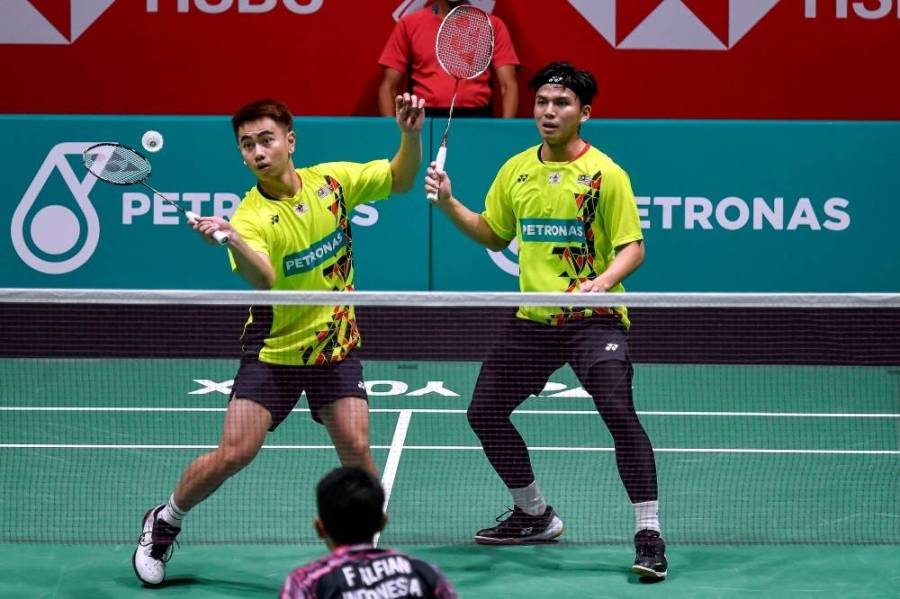 The Malaysian national men's doubles team of Goh Sze Fei and Nur ...